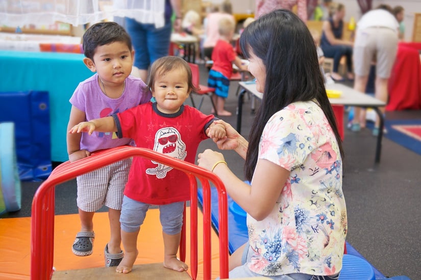 Learning Dressing Skills Through Play